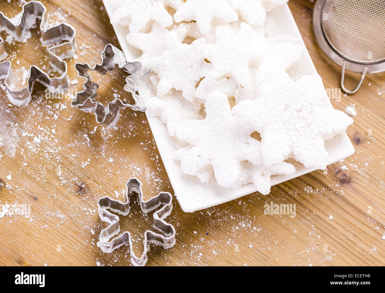 Making marshmallows in shapes of snowflakes for garnish hot chocolate ...