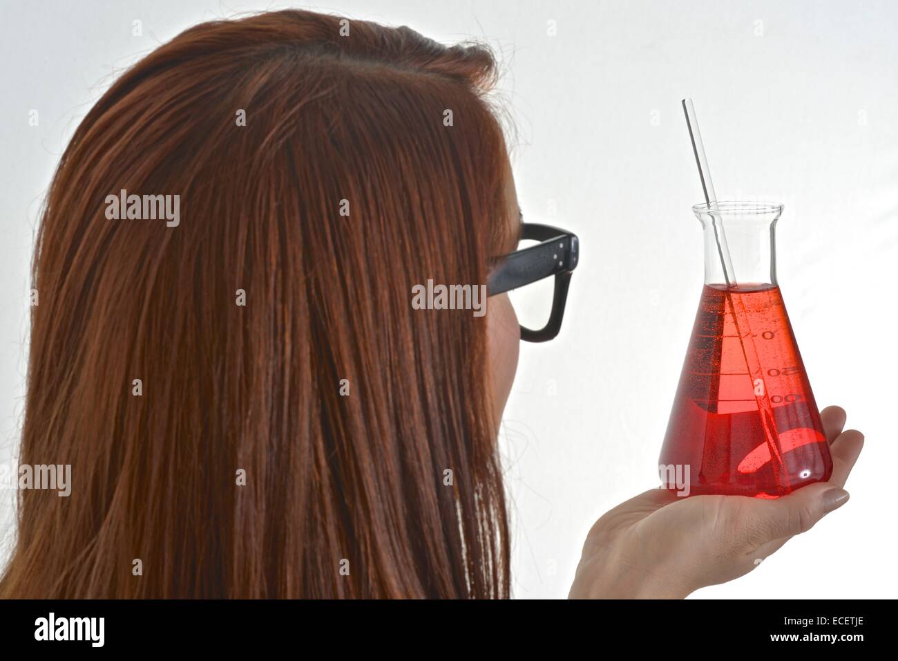 Scientist holding beaker liquid hi-res stock photography and images - Alamy