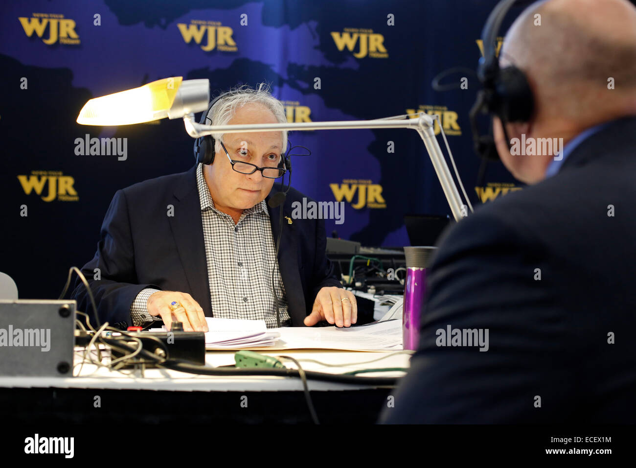 Detroit, Michigan - Paul W. Smith of radio station WJR conducts an ...