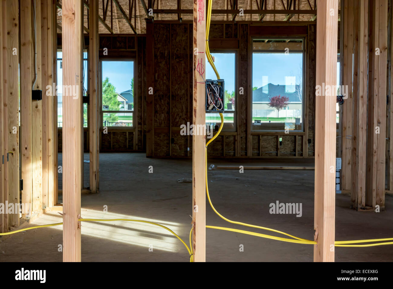 Studs and electrical in new home construction Stock Photo - Alamy