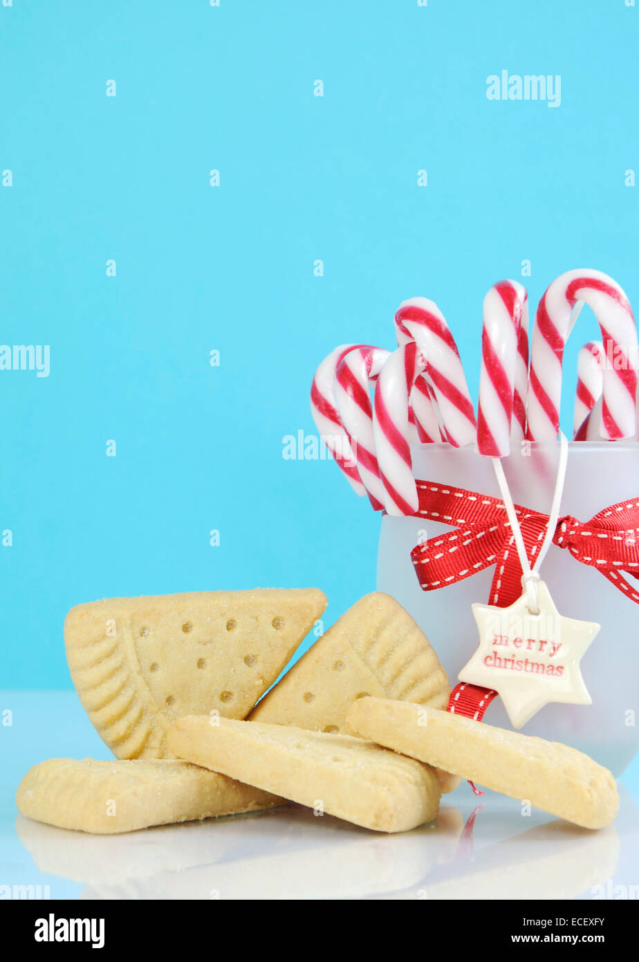Traditional Christmas shortbread triangle shape cookies with jar of ...