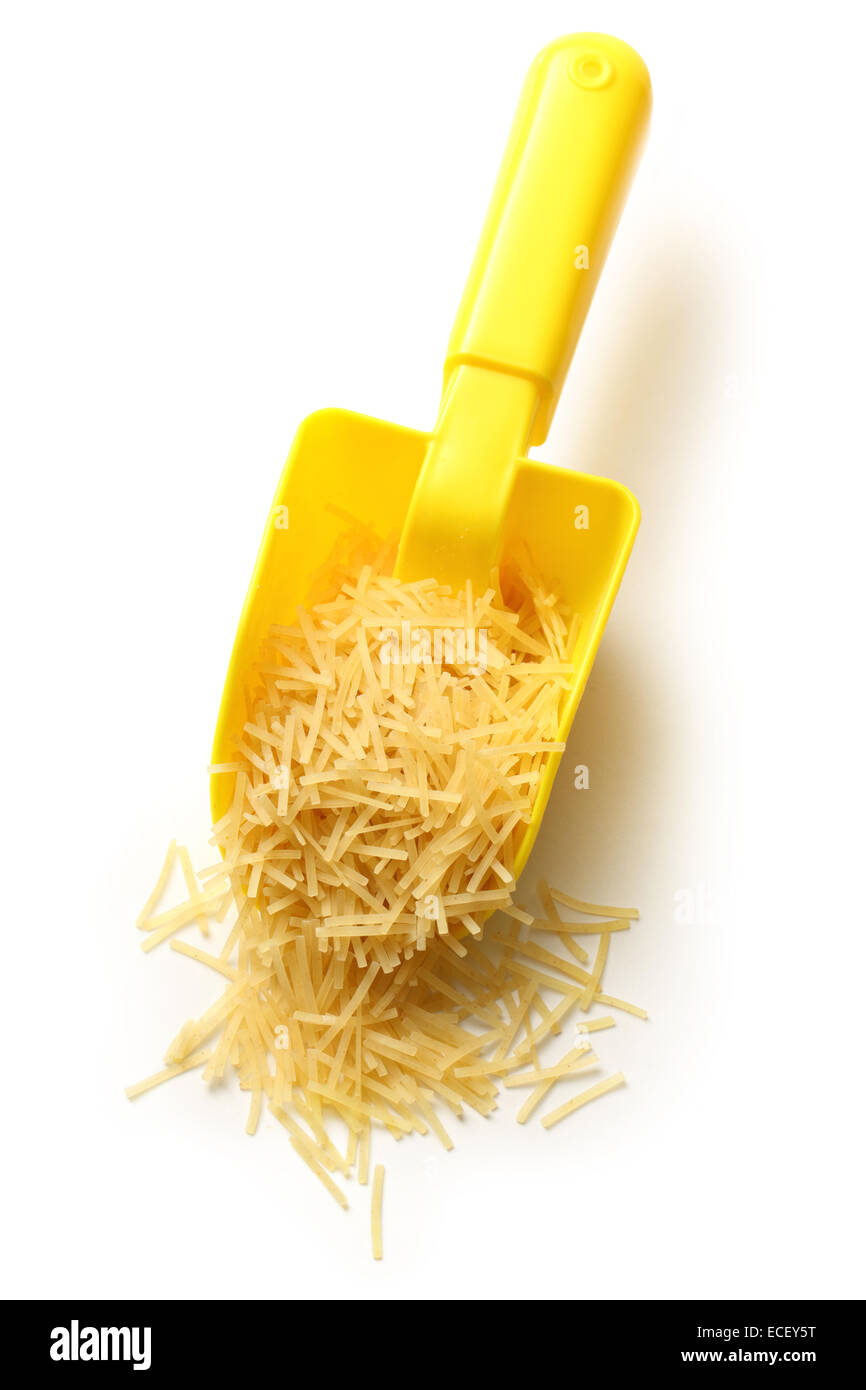 Short thin pasta in yellow spoon Stock Photo - Alamy