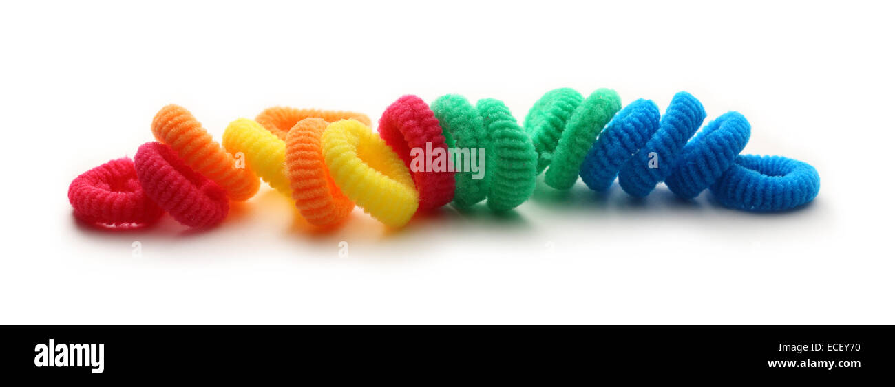Colorful elastic hair bands on white background Stock Photo - Alamy