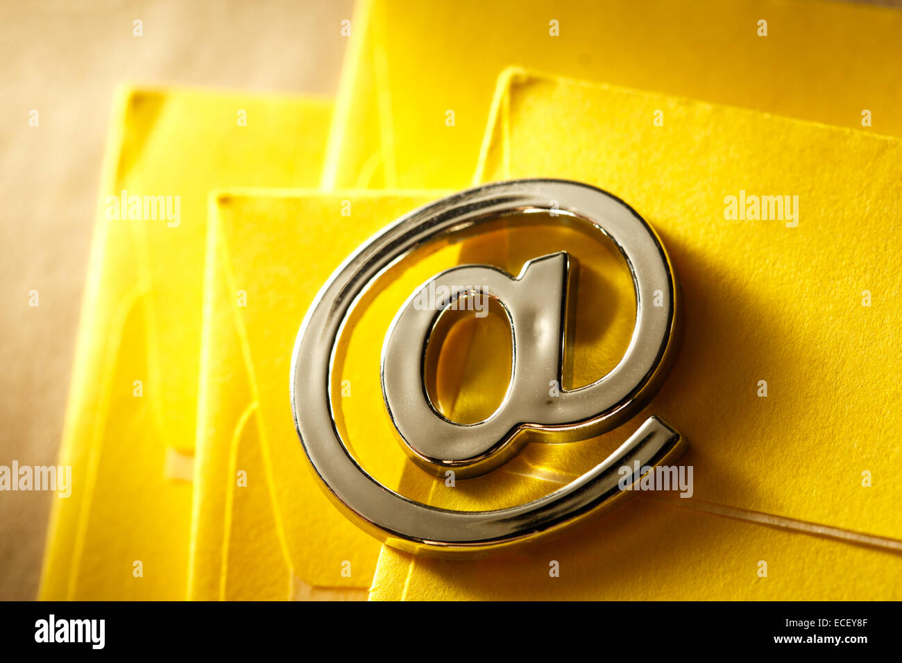 Email international sign on blank envelopes Stock Photo - Alamy