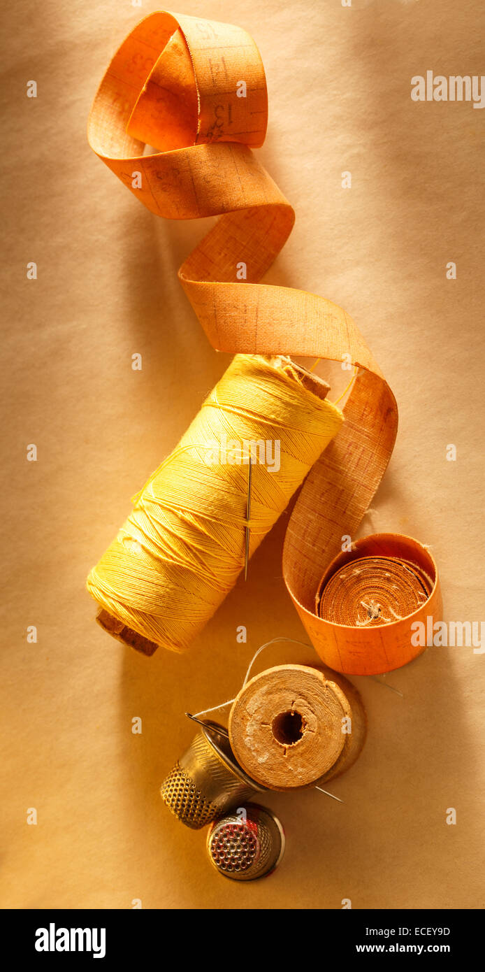 Sewing items, meter and thimble Stock Photo - Alamy