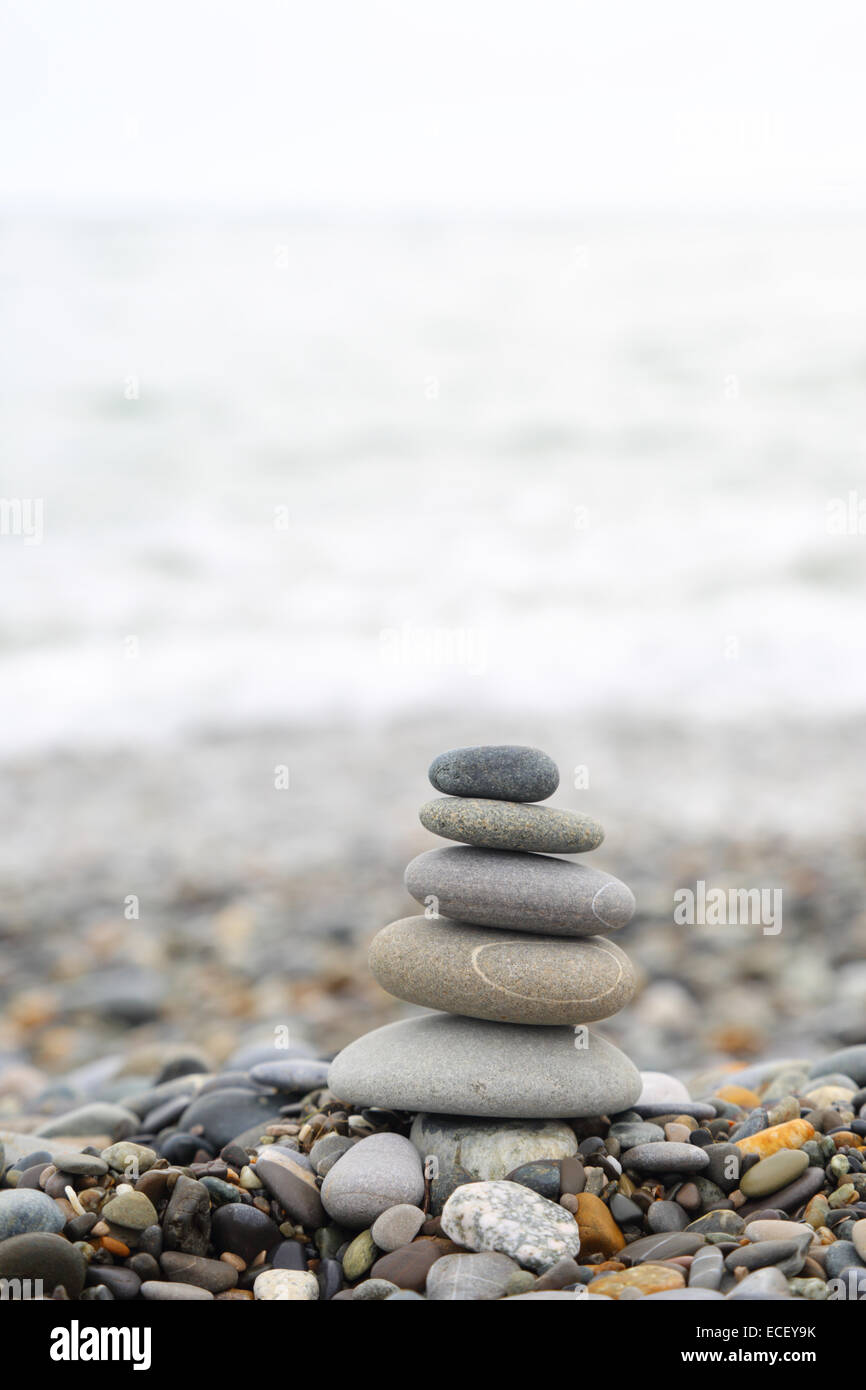 Seashore background with stone construction Stock Photo - Alamy