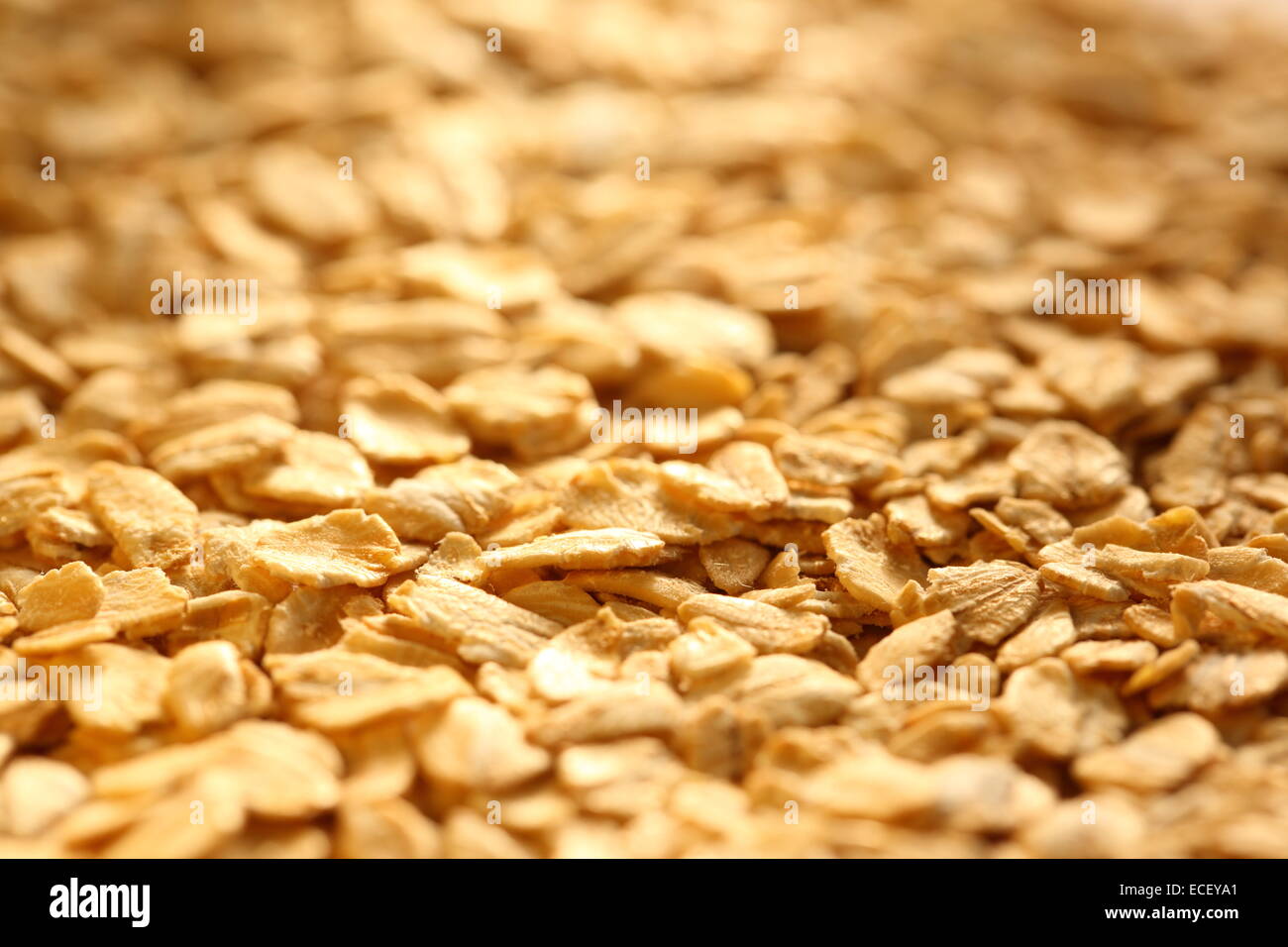 Dry oats cereal as background Stock Photo - Alamy