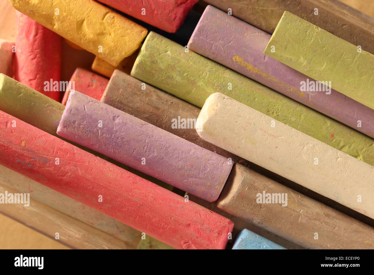 Pastel chalks in heap closeup Stock Photo - Alamy