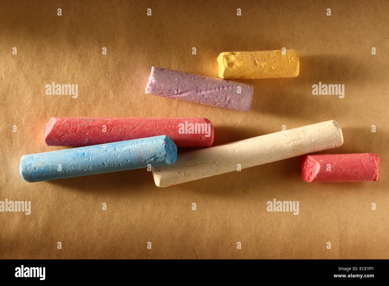Pastel chalks in heap on paper Stock Photo - Alamy
