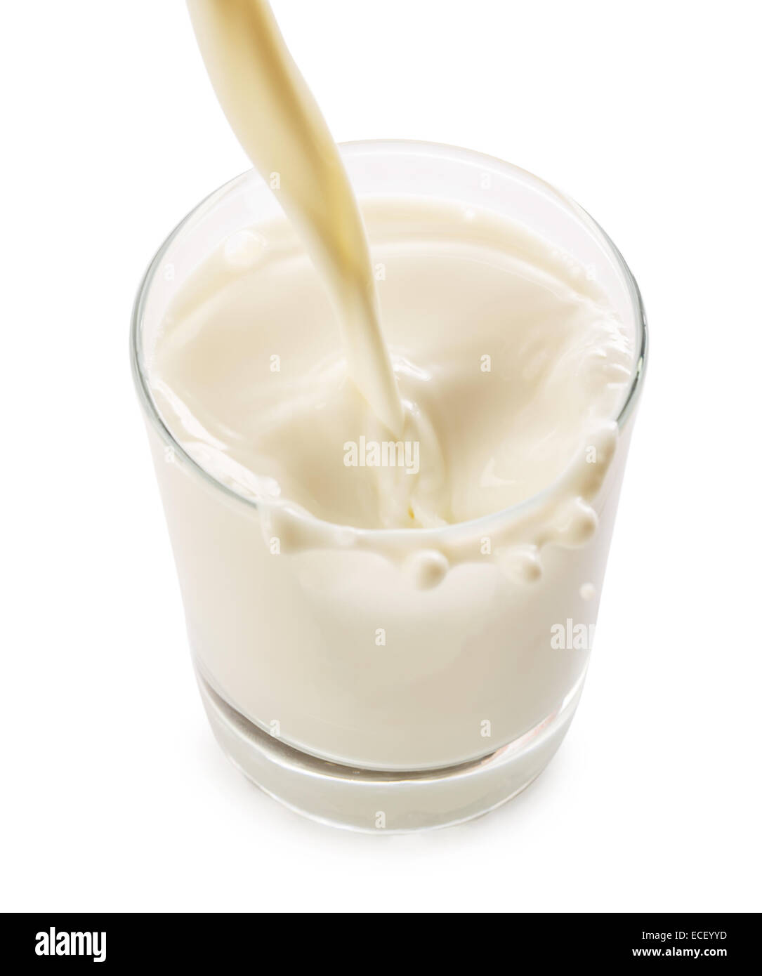 Pouring yogurt into glass isolated Stock Photo - Alamy