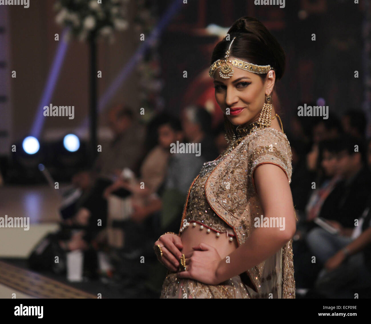 Pakistani model presents creations by Pakistani designers Aisha Imran ...