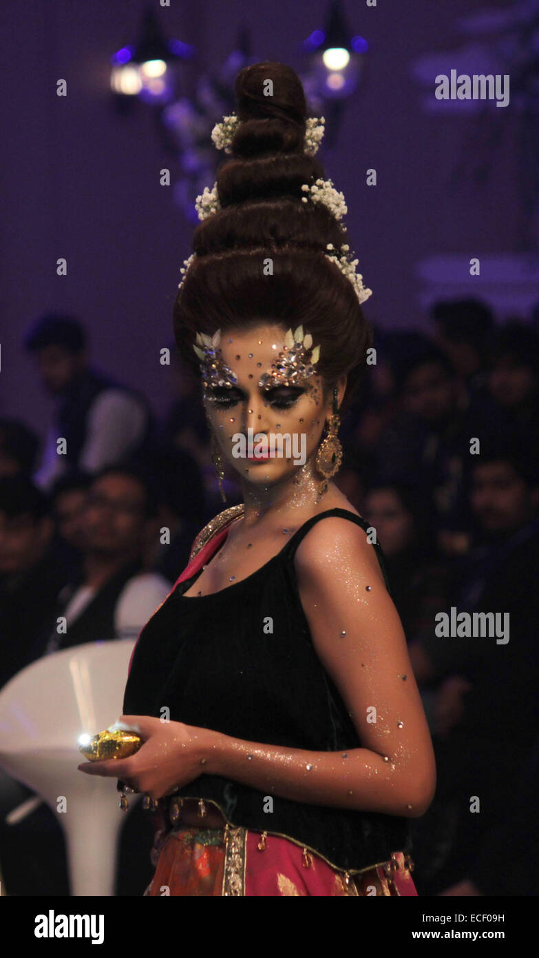 Pakistani model presents creations by Pakistani designers Aisha Imran ...