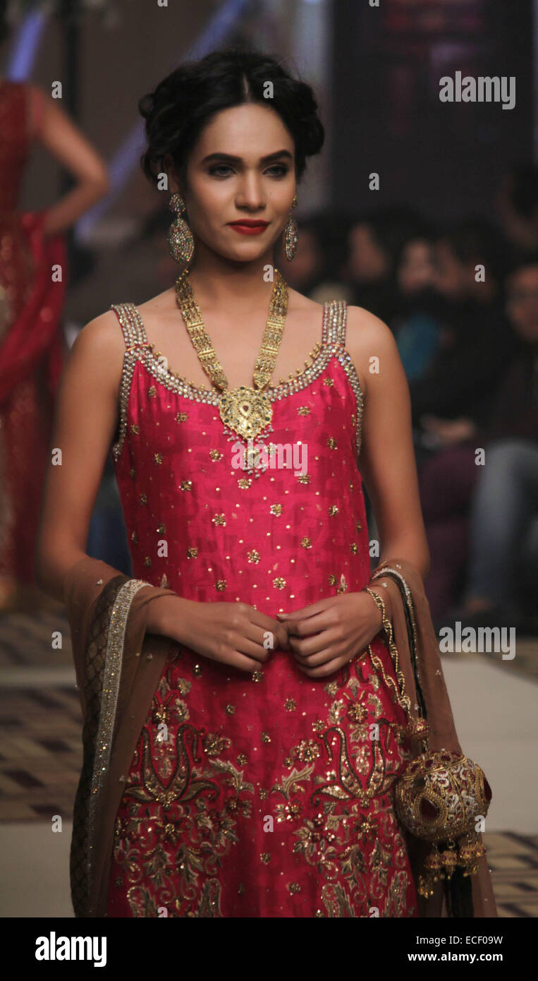 Pakistani model presents creations by Pakistani designers Aisha Imran ...