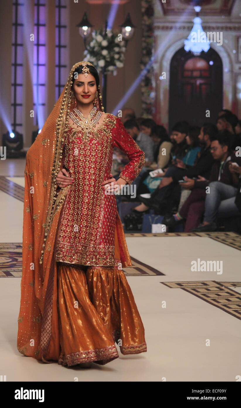 Pakistani model presents creations by Pakistani designers Aisha Imran ...