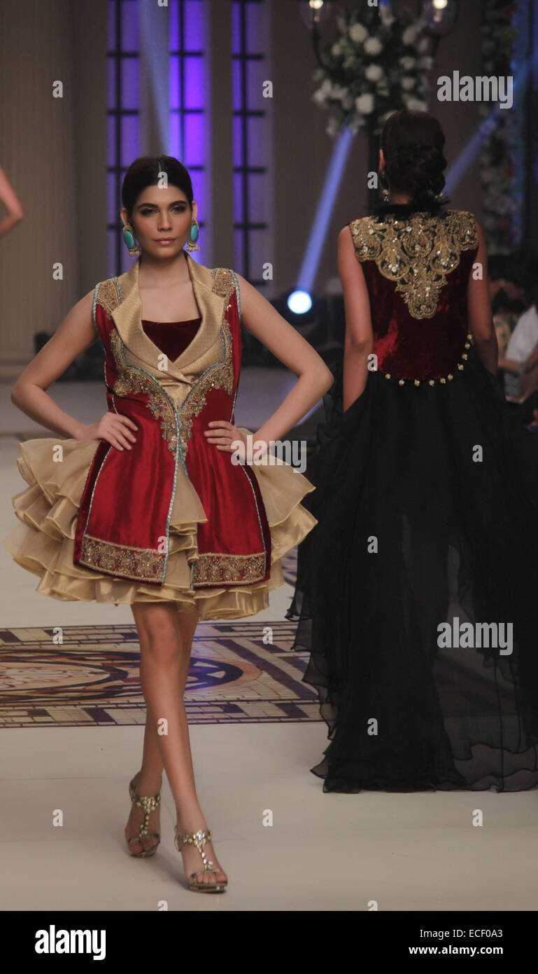 Pakistani model presents creations by Pakistani designers Aisha Imran ...