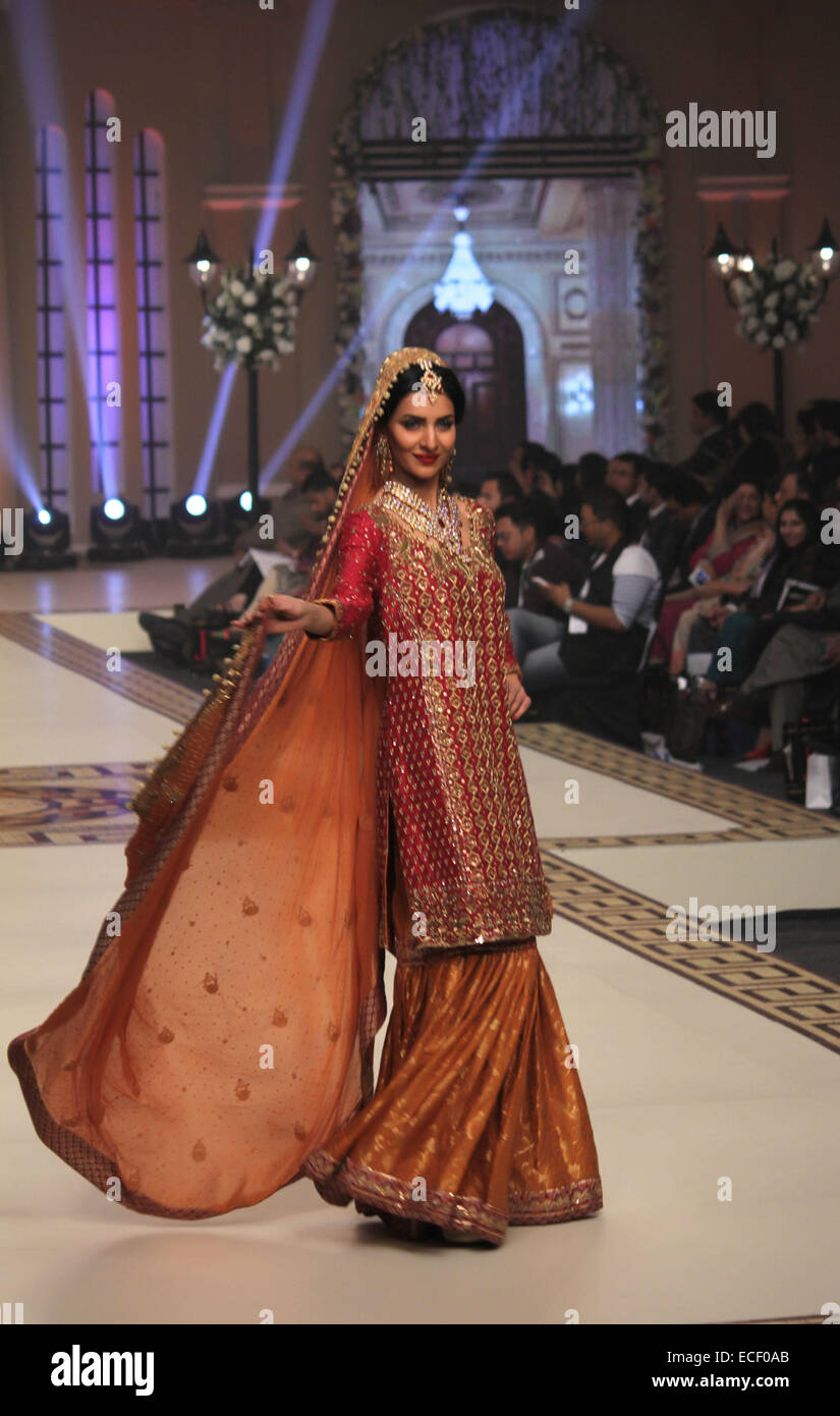Pakistani model presents creations by Pakistani designers Aisha Imran ...