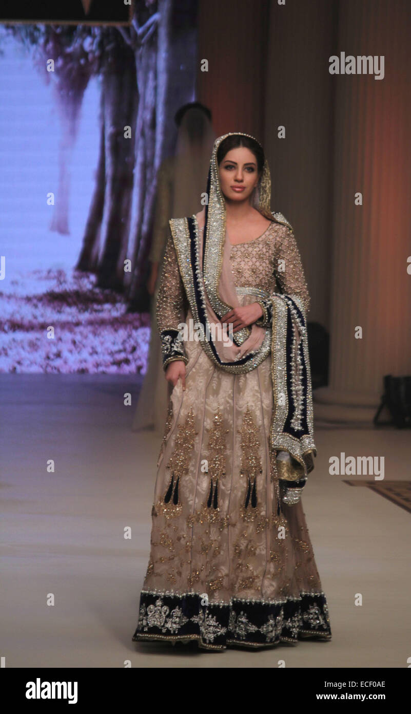 Pakistani model presents creations by Pakistani designers Aisha Imran ...