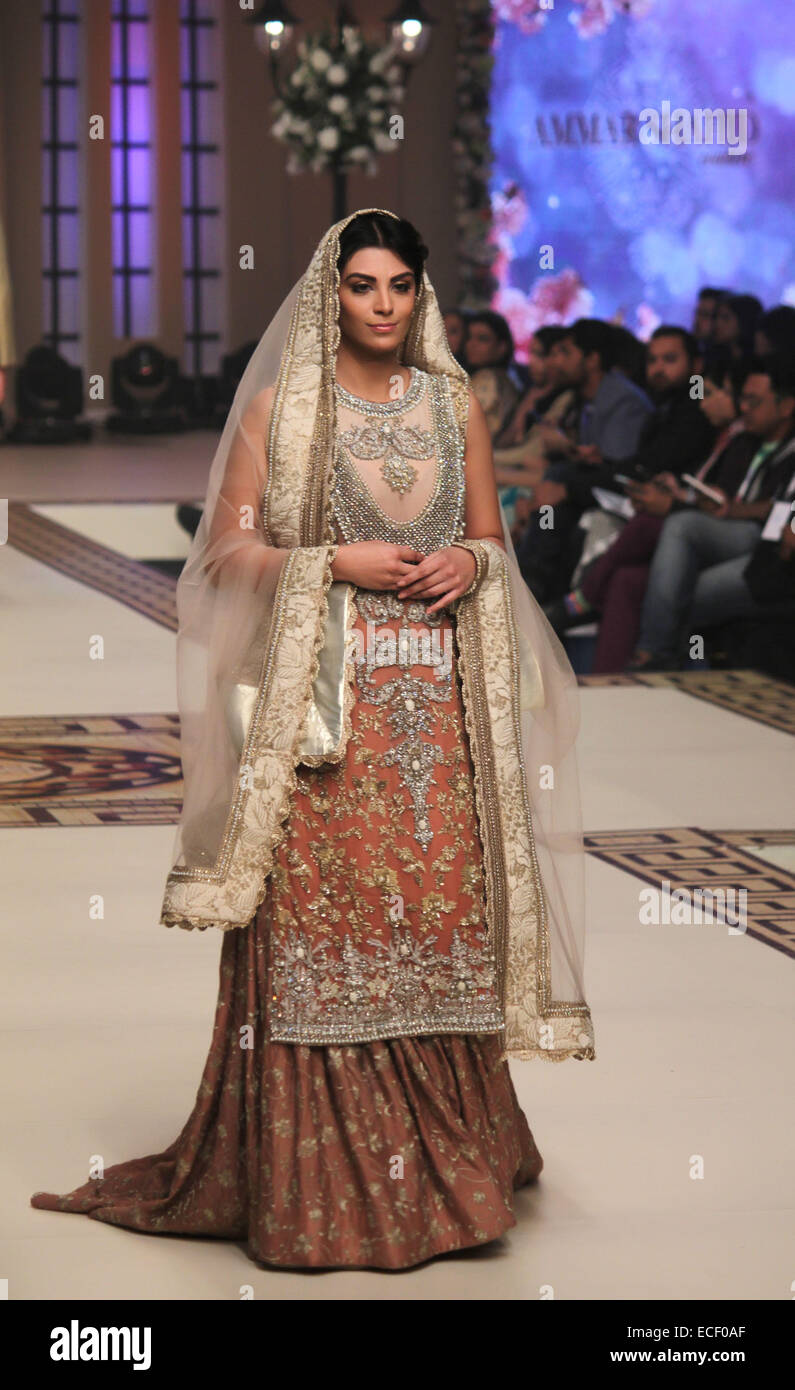 Pakistani model presents creations by Pakistani designers Aisha Imran ...