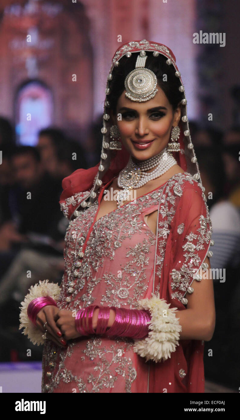 Pakistani model presents creations by Pakistani designers Aisha Imran ...