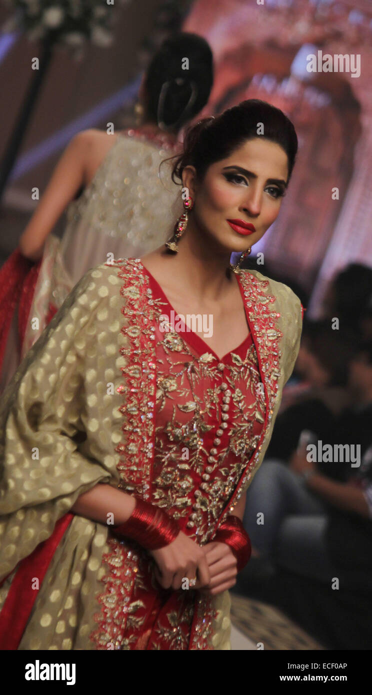 Pakistani model presents creations by Pakistani designers Aisha Imran ...