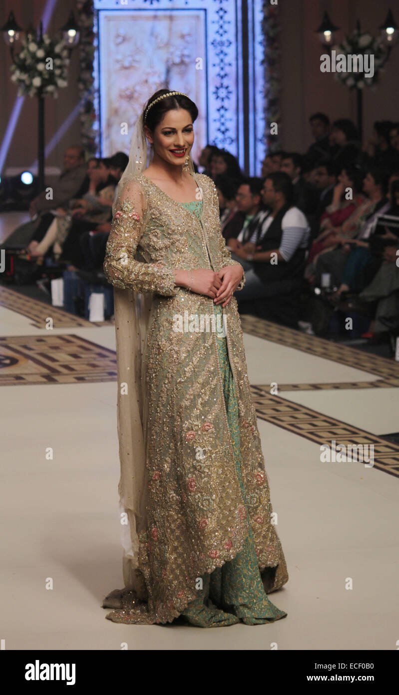 Pakistani model presents creations by Pakistani designers Aisha Imran ...