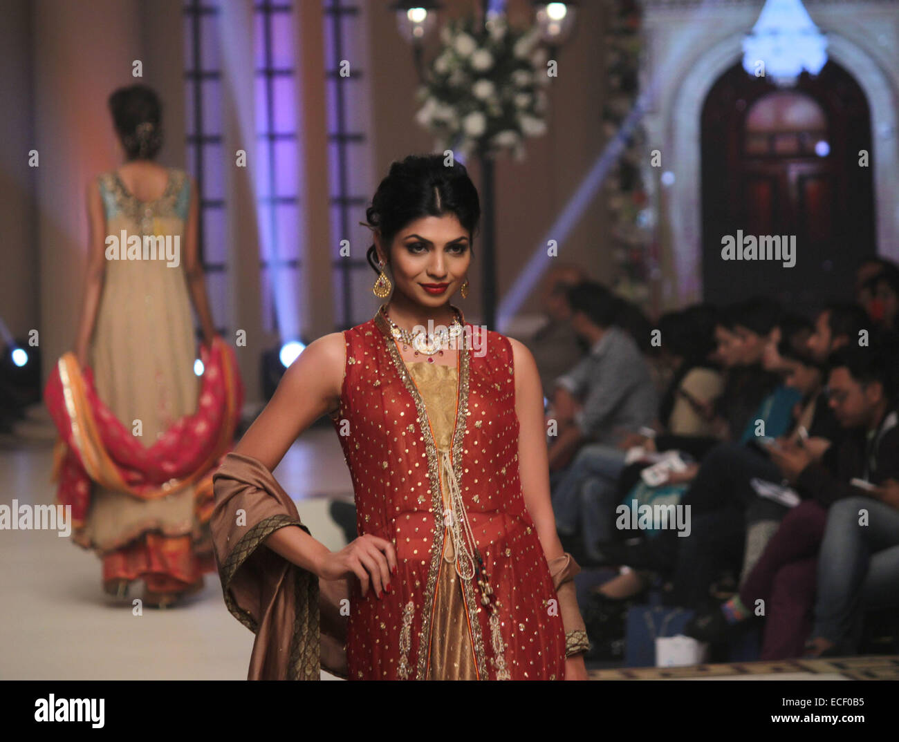 Pakistani model presents creations by Pakistani designers Aisha Imran ...