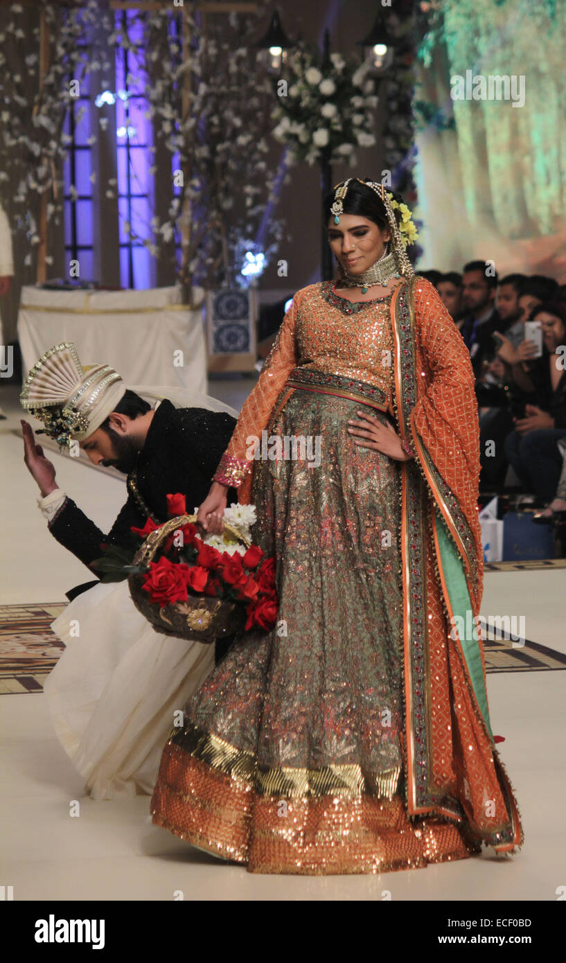 Pakistani model presents creations by Pakistani designers Aisha Imran ...