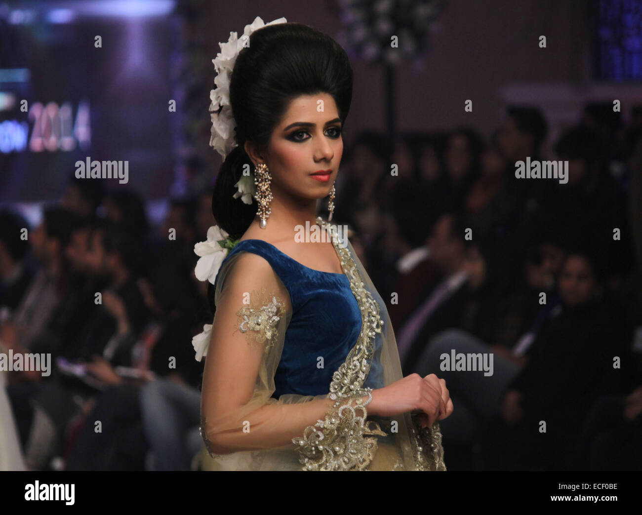 Pakistani model presents creations by Pakistani designers Aisha Imran ...