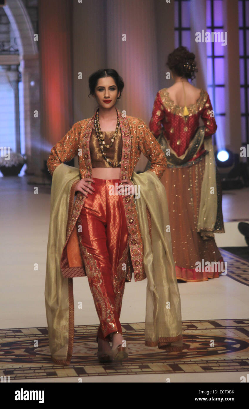 Pakistani model presents creations by Pakistani designers Aisha Imran ...