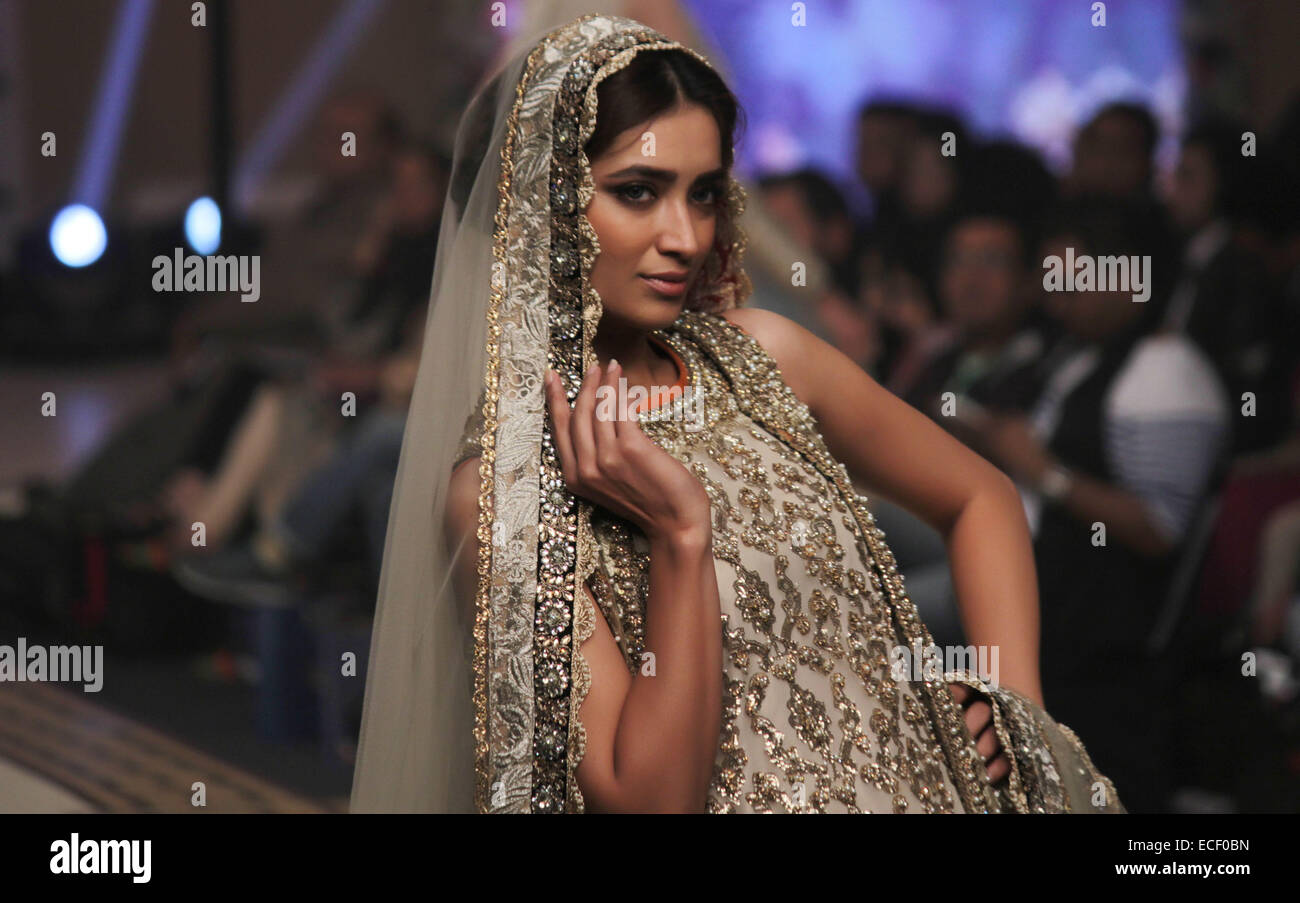 Pakistani model presents creations by Pakistani designers Aisha Imran ...