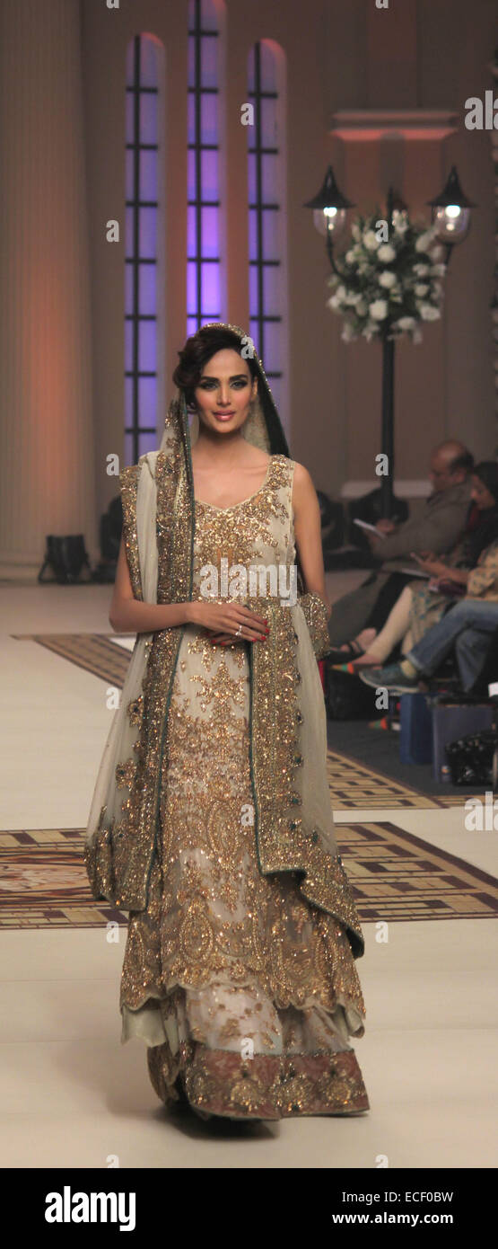 Pakistani model presents creations by Pakistani designers Aisha Imran ...