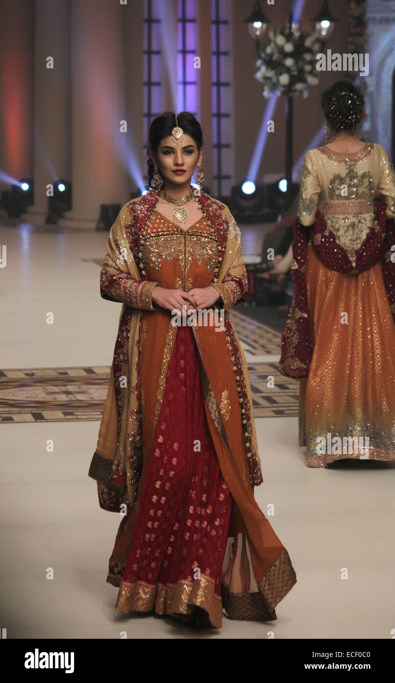 Pakistani model presents creations by Pakistani designers Aisha Imran ...