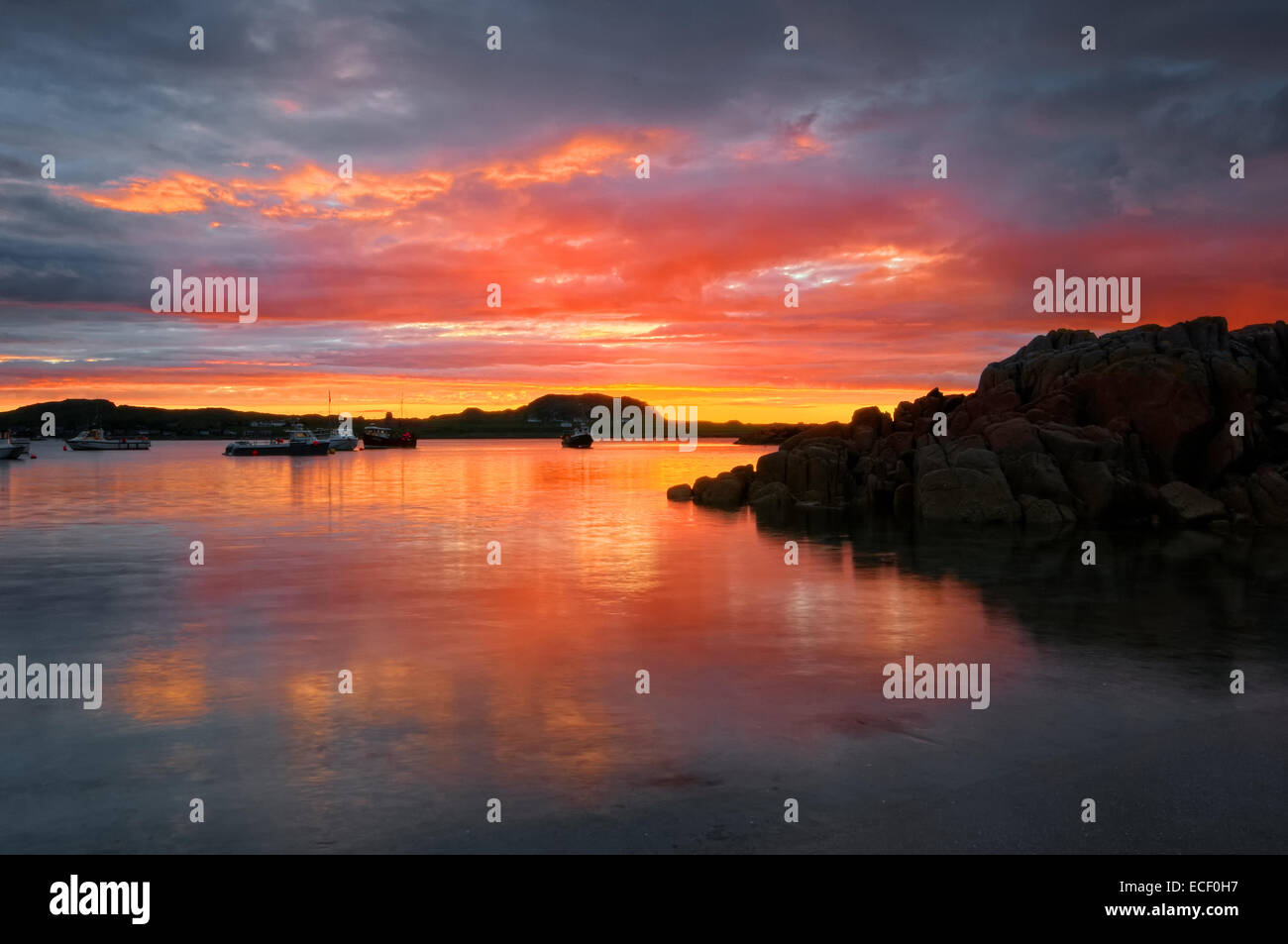 A stunning sunset over the Isle of Iona looking from the Isle of Mull ...