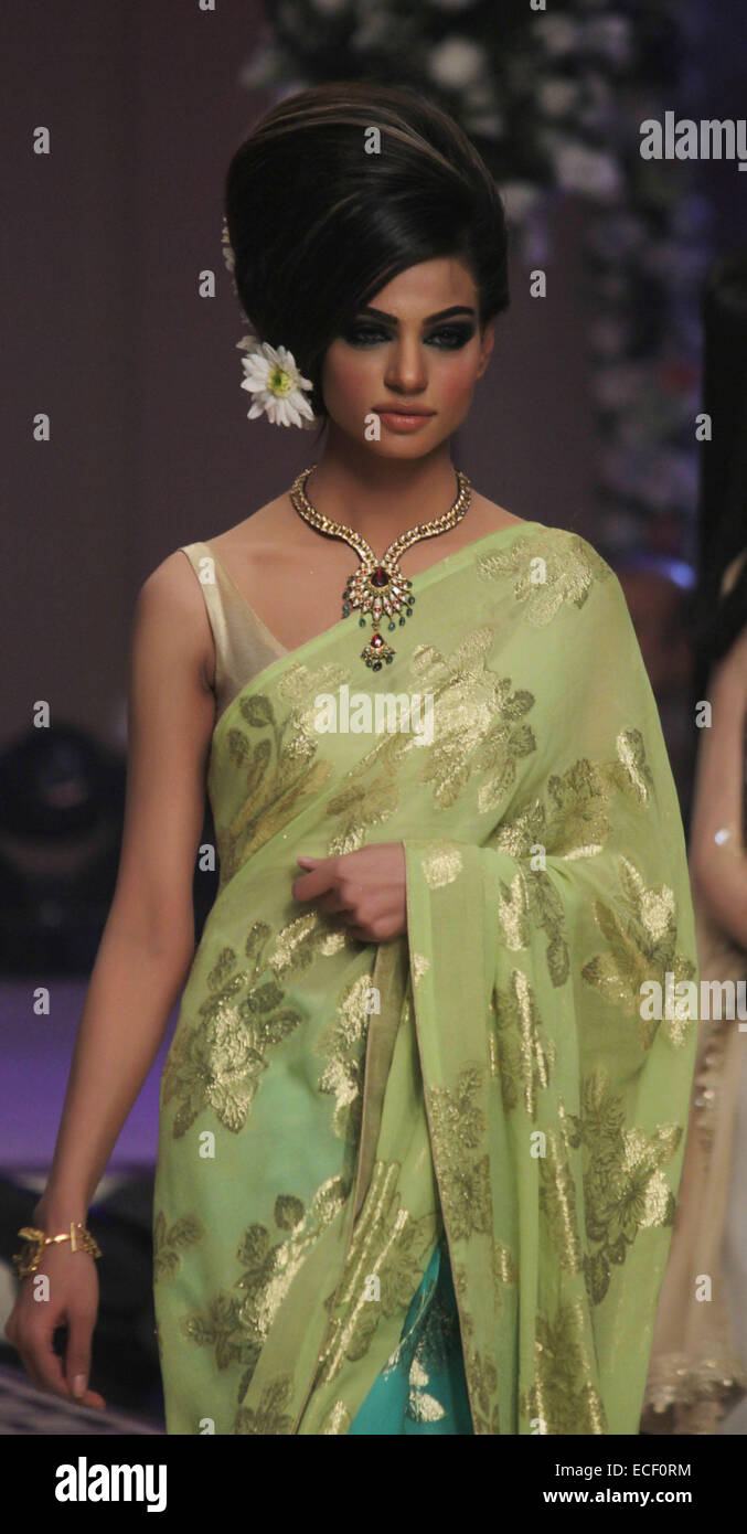 Pakistani model presents creations by Pakistani designers Aisha Imran ...