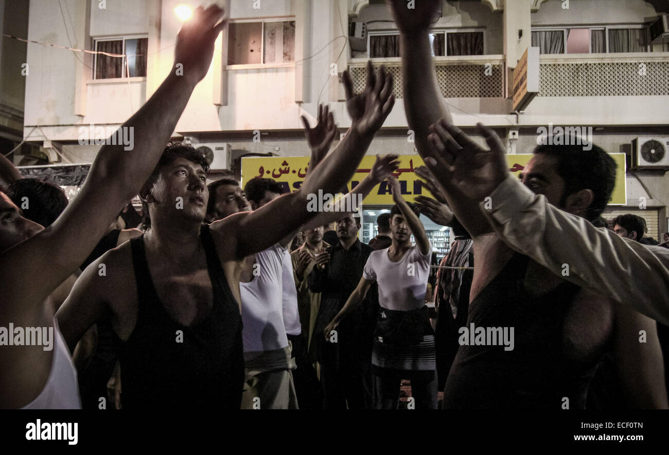 Male Shia Muslims take part in ceremonial chest beating parade as a ...