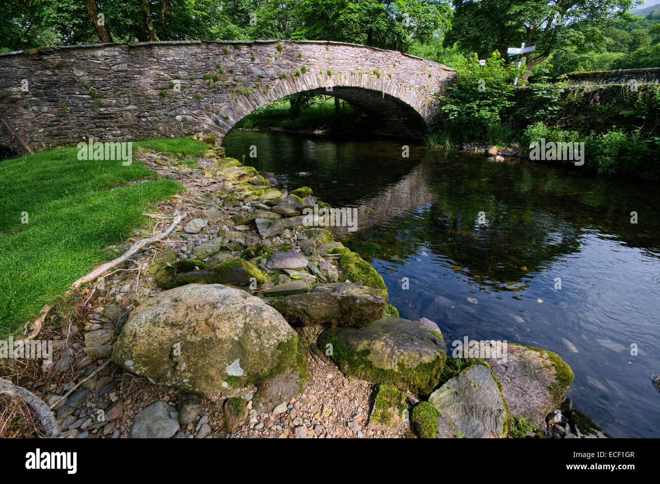 Pelter Bridge spanning the River Rothay 2 miles north of Ambleside in ...