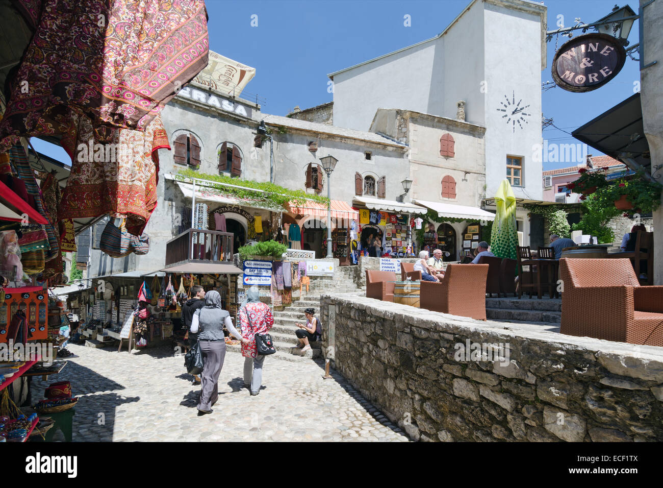 MOSTAR, BOSNIA AND HERZEGOVINA - MAY 18, 2013: Tourists look at the ...