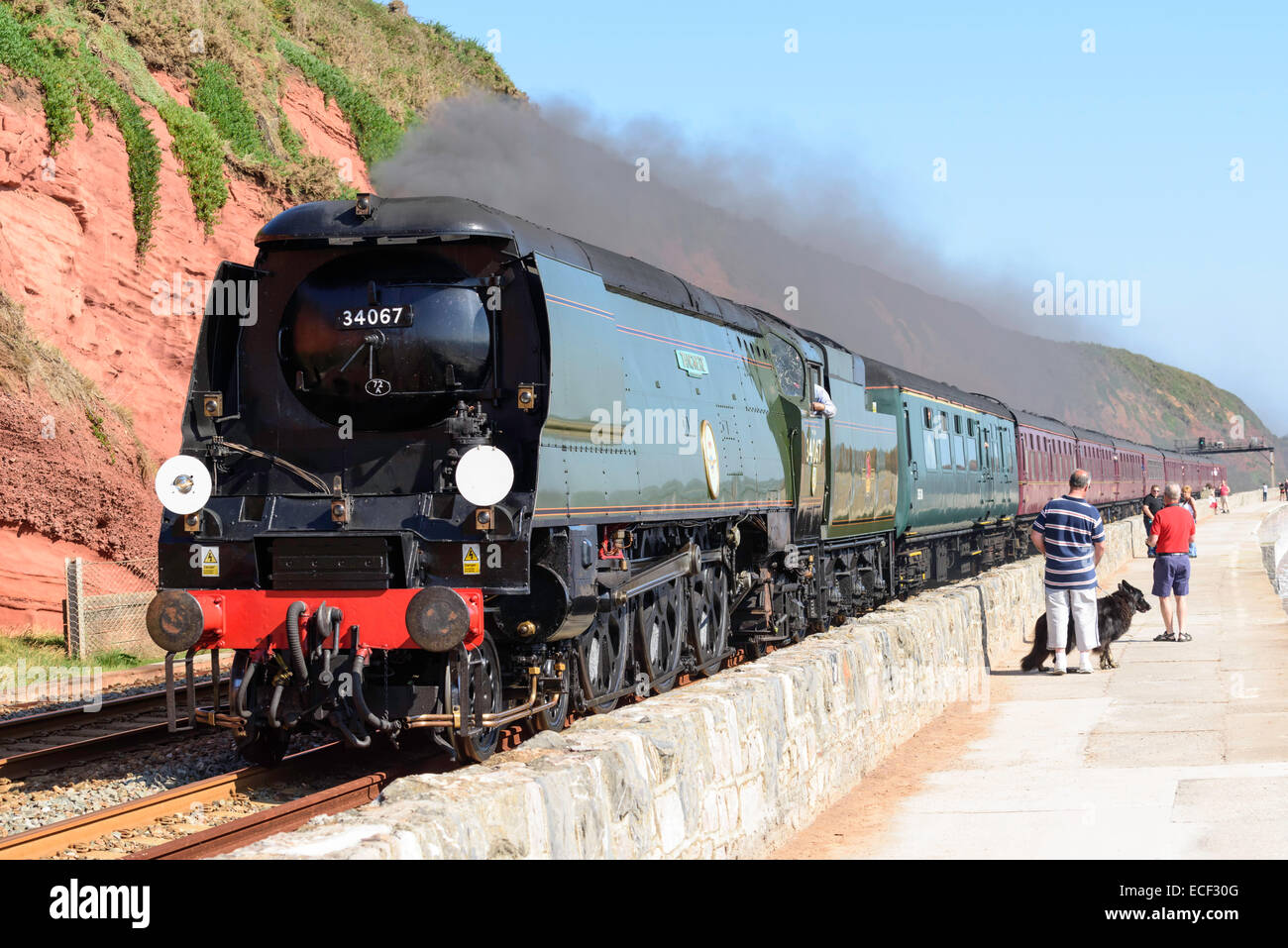 Steam locomotive 34067 Tangmere with The Royal Duchy train passes along ...