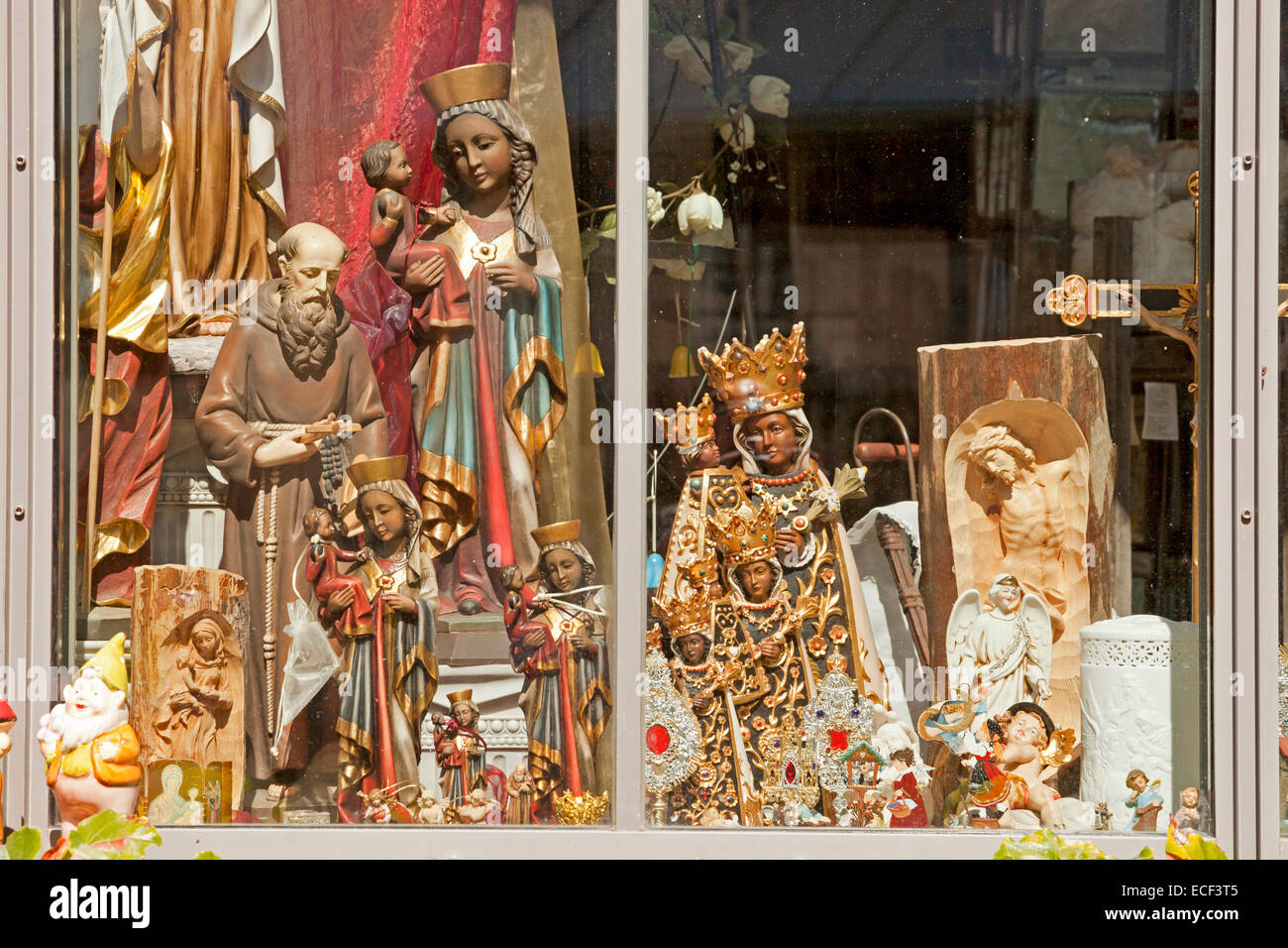 shop window with religious souvenirs on Kapellplatz square in ...
