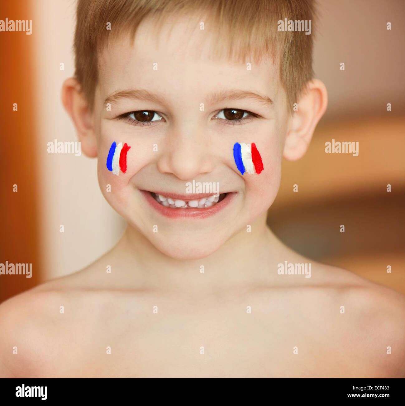 Cute little boy with European flags on cheeks Stock Photo - Alamy