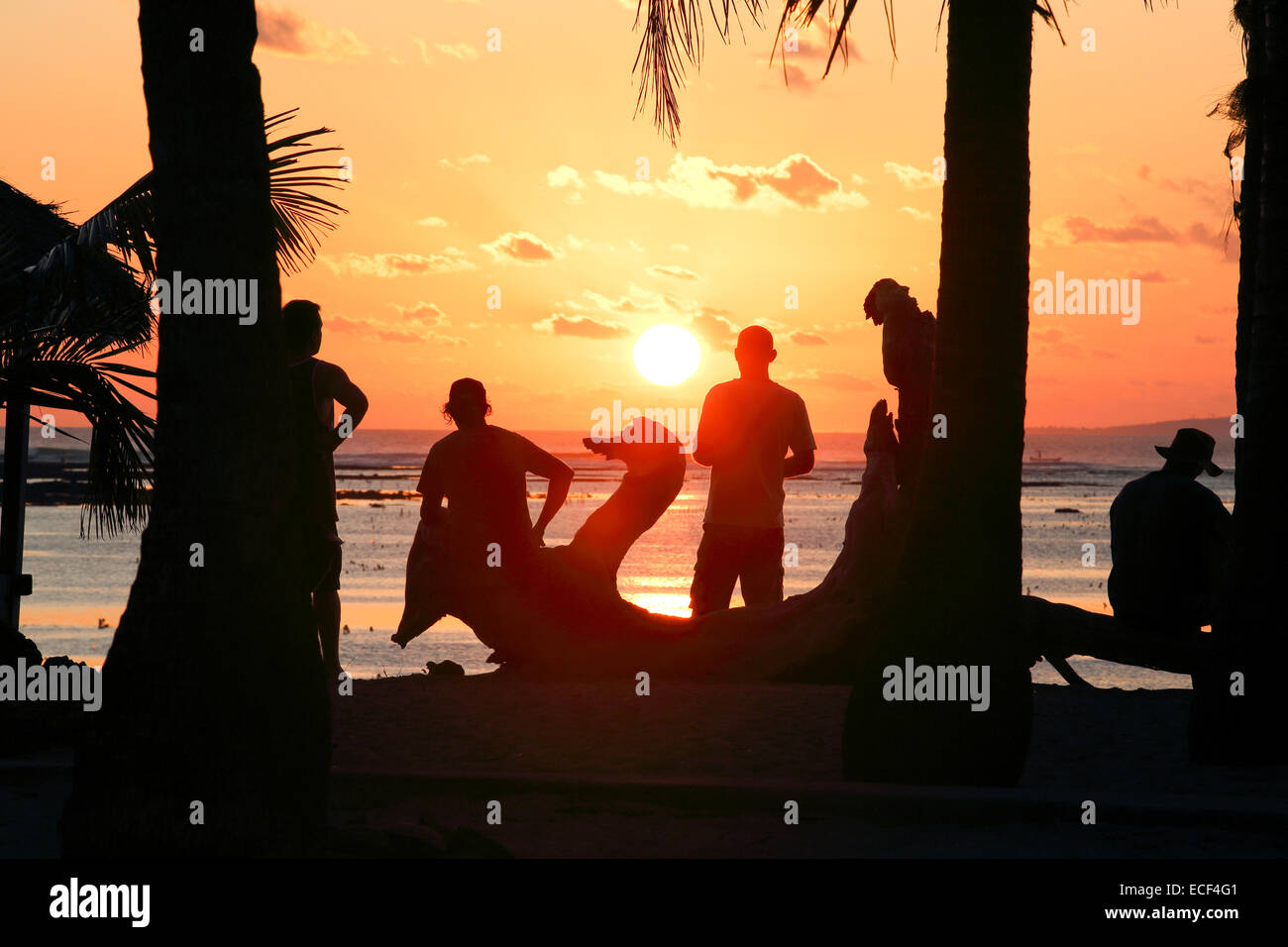 Watching sunset at Nembrala Beach on Rote Island, Indonesia Stock Photo ...