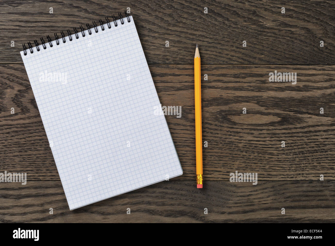 open notebook for writing or drawing on oak table, copy space for ...