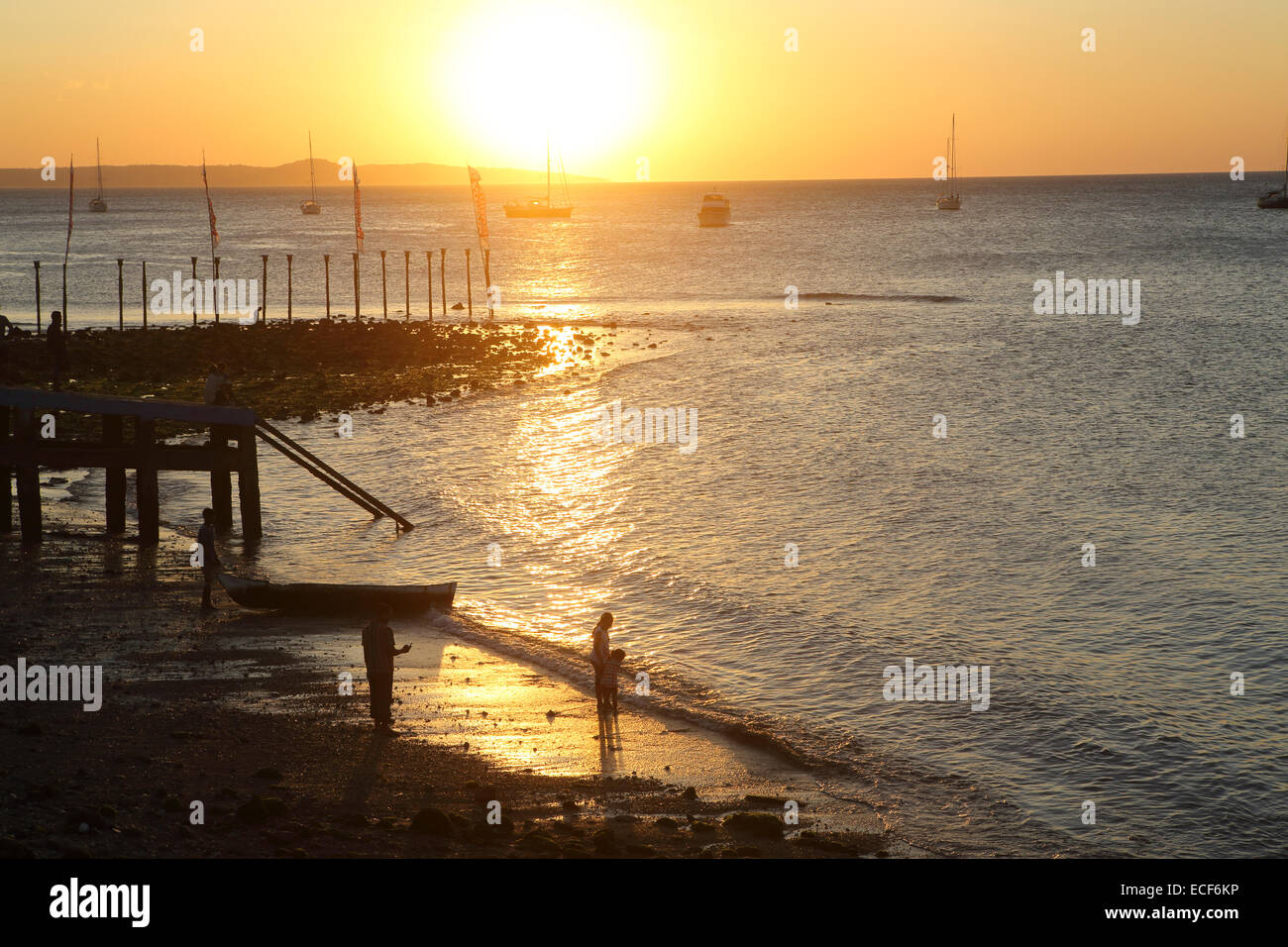 Waterfront sunset in Kupang, West Timor Stock Photo - Alamy