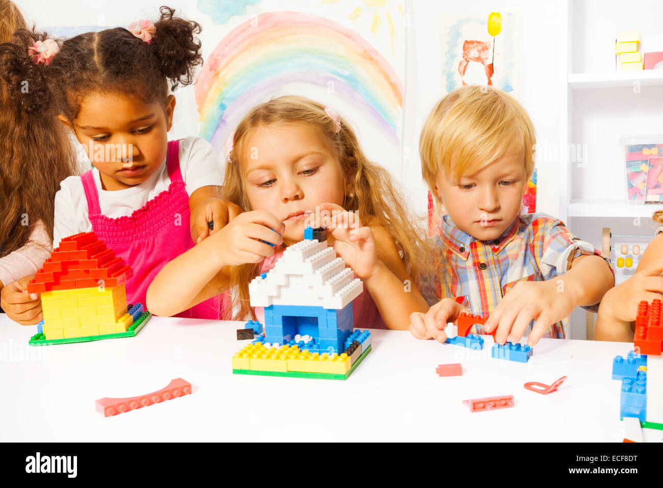 Kids playing with blocks in classroom hi-res stock photography and ...