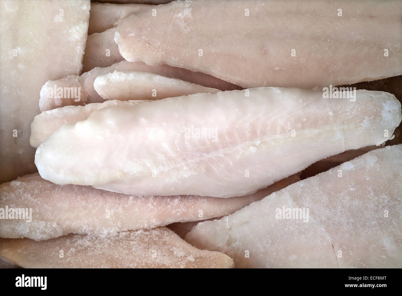 several slices of frozen fish Stock Photo - Alamy