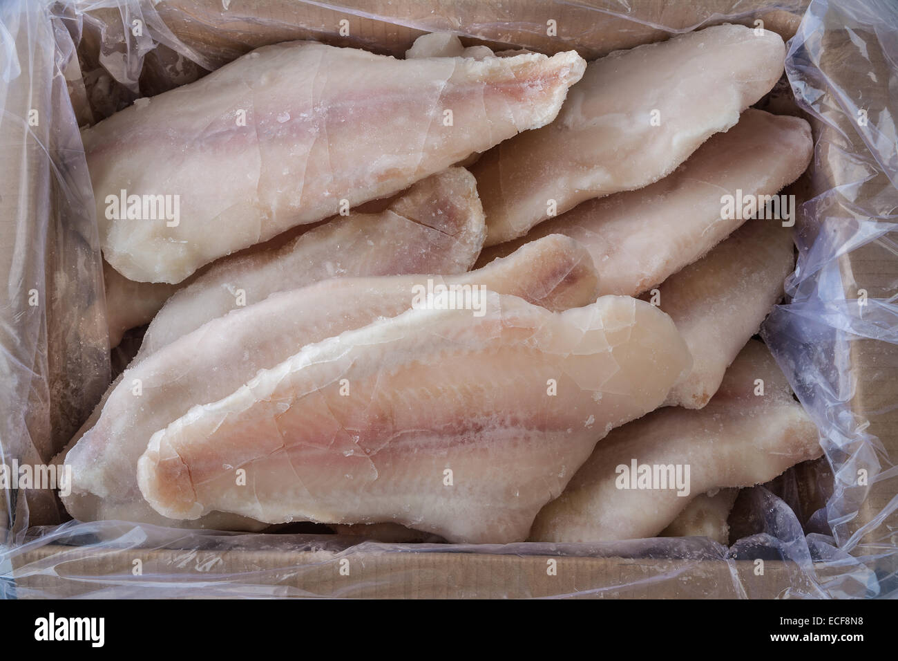 several slices of frozen fish Stock Photo - Alamy