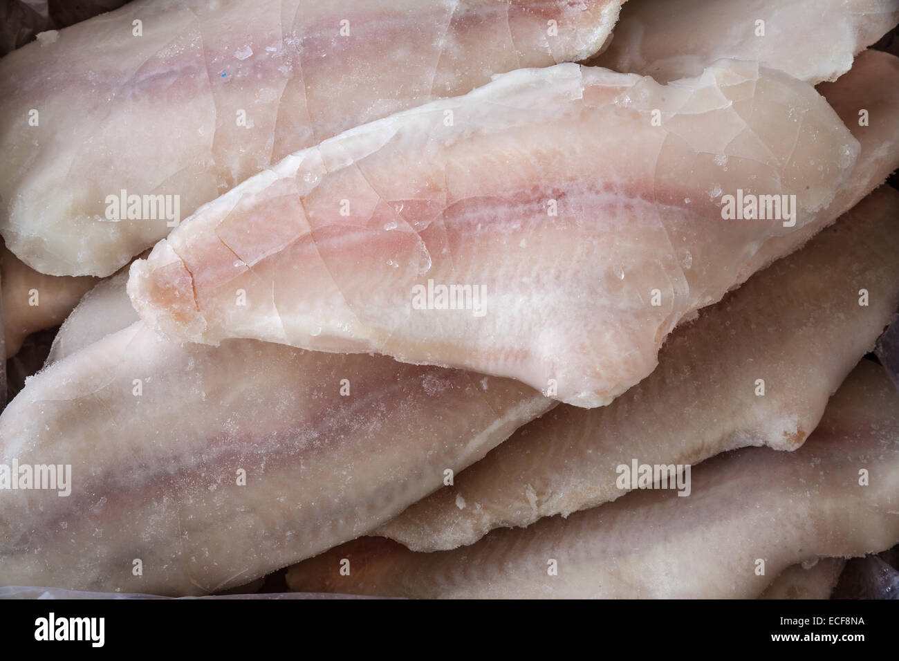 several slices of frozen fish Stock Photo - Alamy