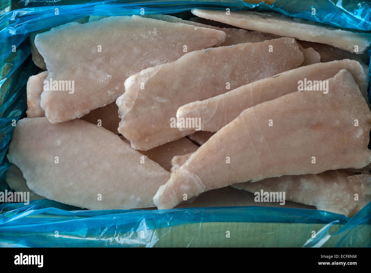 several slices of frozen fish Stock Photo - Alamy