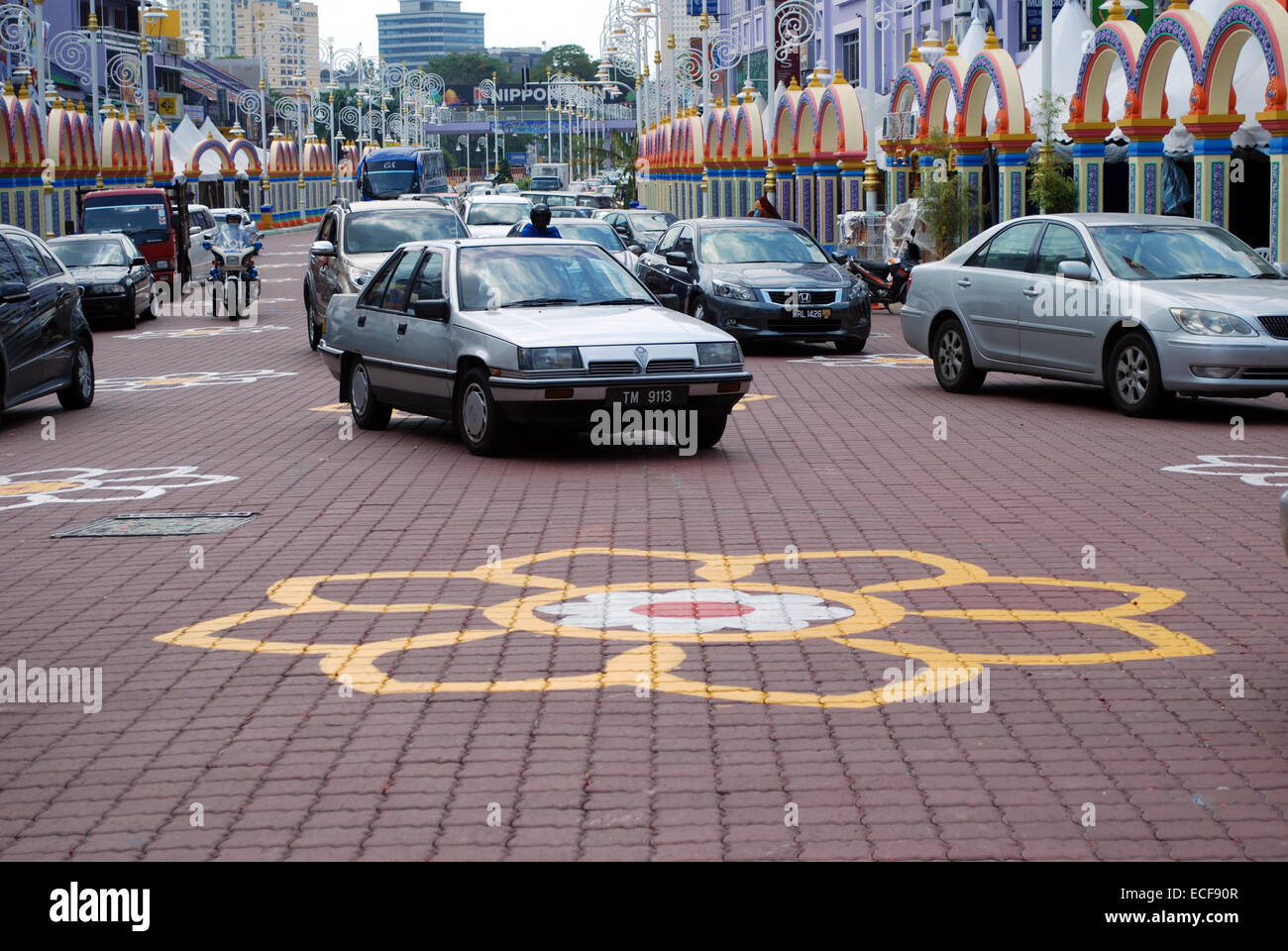 Kolam design painted on road in Little India, Brickfields, Kuala Lumpur ...