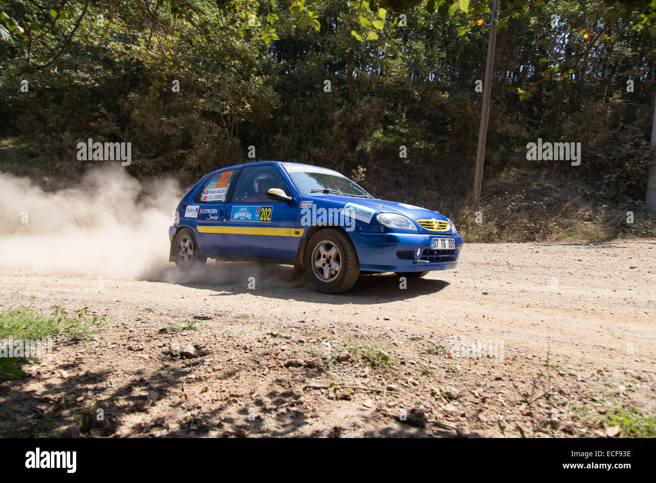 ISTANBUL, TURKEY - AUGUST 16, 2014: Kutlu Demiriz drives Citroen Saxo ...